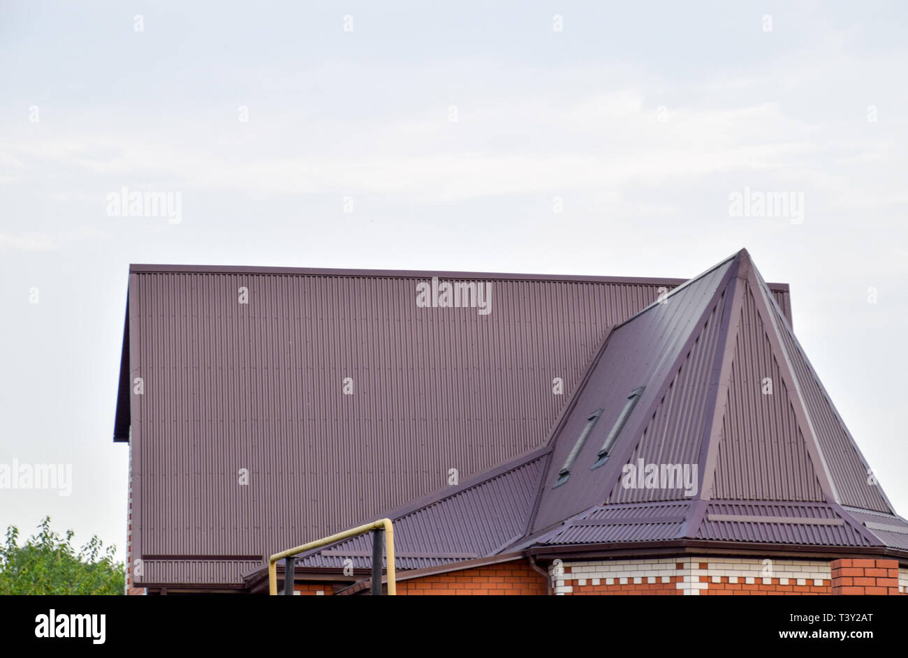 The roof of corrugated sheet. Roofing of metal profile wavy shape Stock ...