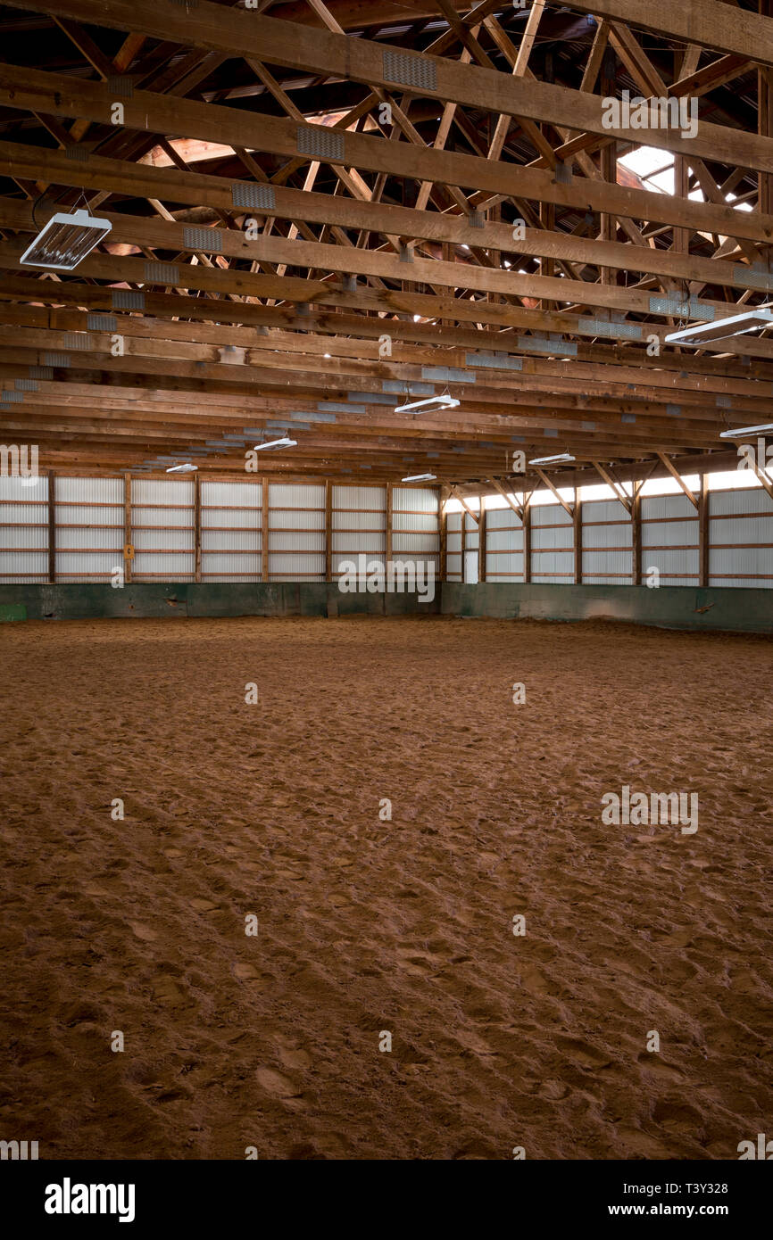 Empty indoor horse riding ring Stock Photo - Alamy
