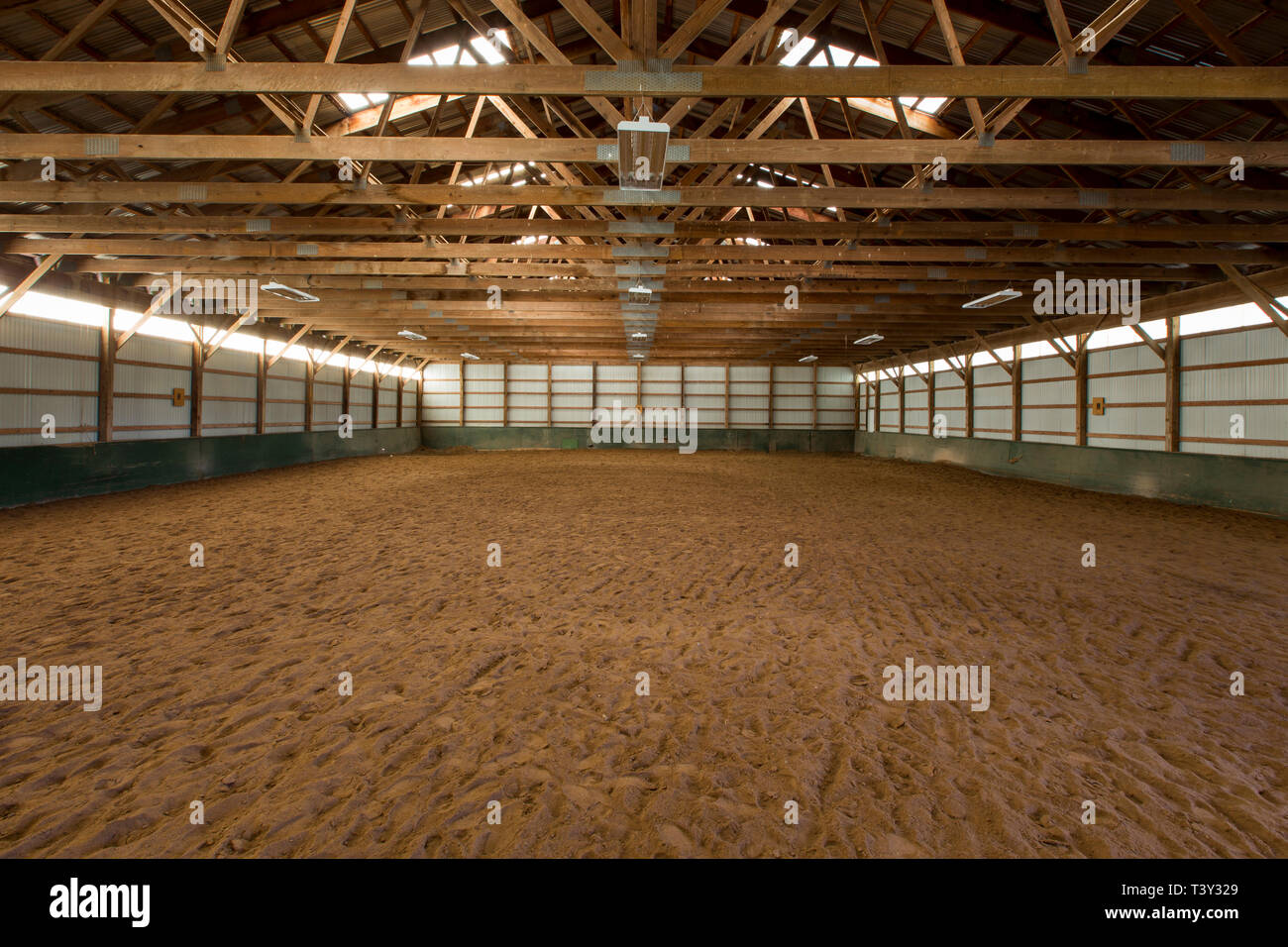 Empty indoor horse riding ring Stock Photo - Alamy