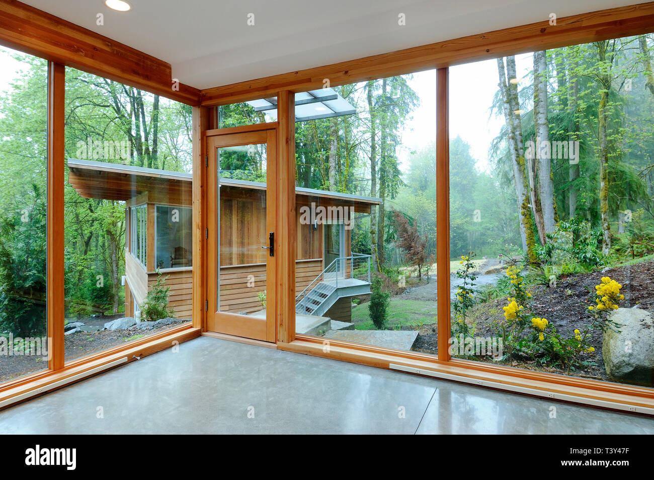 Glass windows in modern home Stock Photo - Alamy