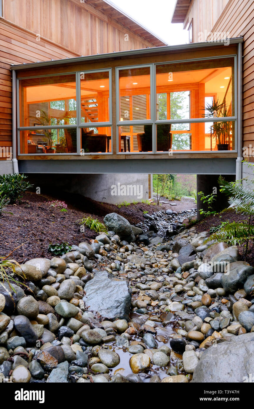 Corridor of modern house built over rocky creek Stock Photo - Alamy