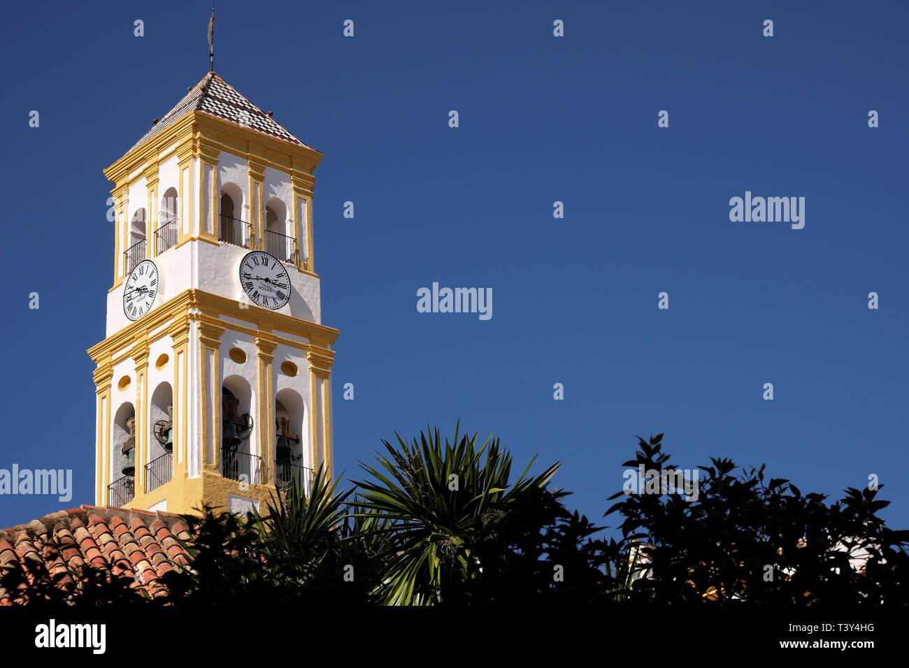 Marbella old town church bell tower isolated blue sky Stock Photo - Alamy