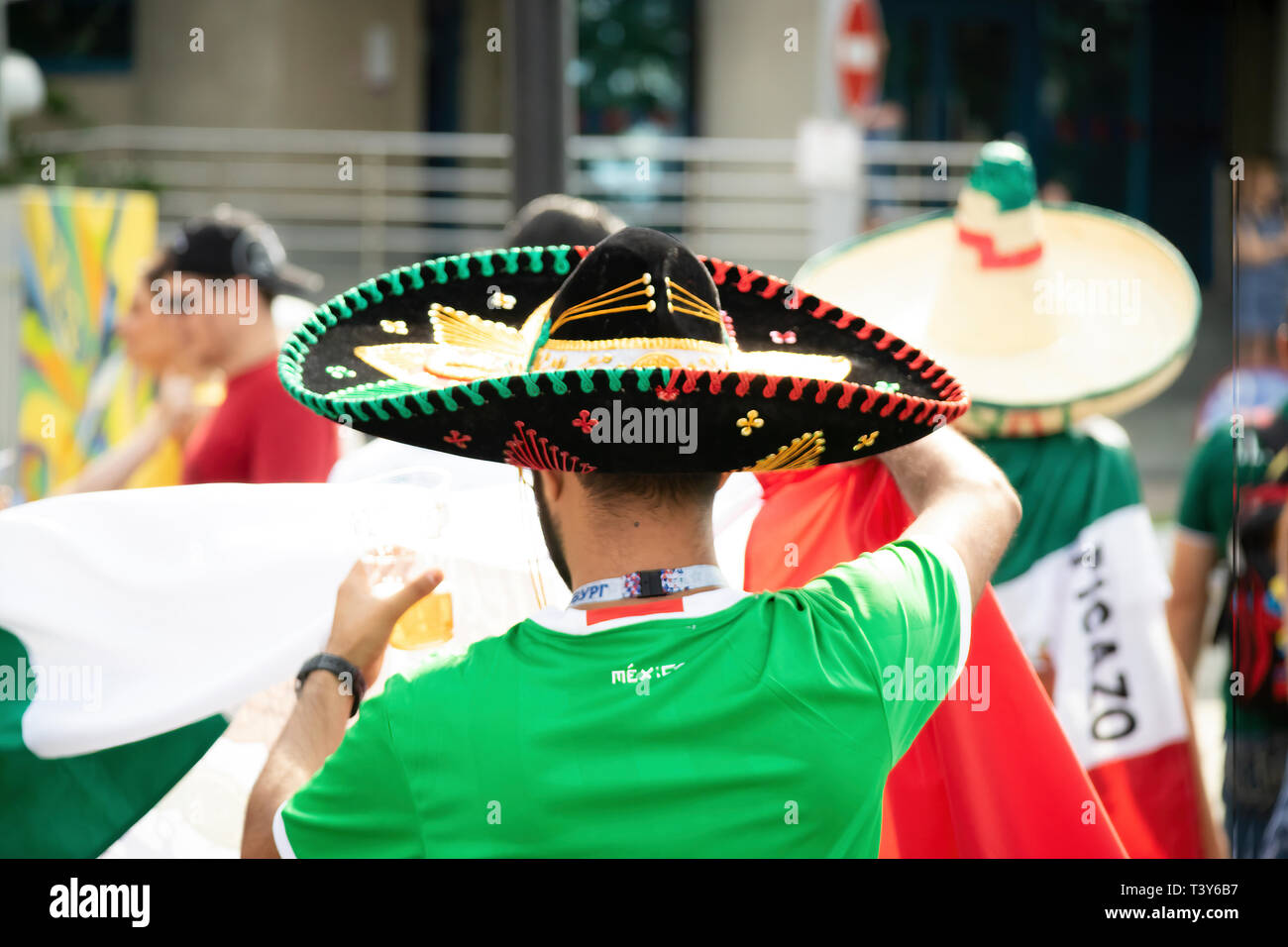 Rear view of male Mexican fan wearing colourful sombrero - FIFA World ...