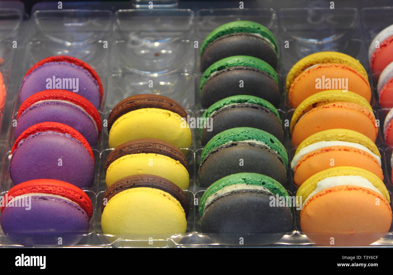 Colorful macaron cookies for sale at luxury bakery in Paris, France ...