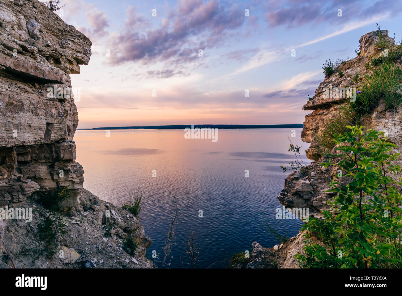 View on sunset on river through gorge Stock Photo - Alamy