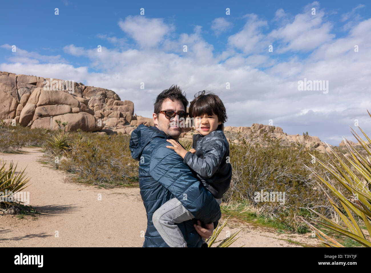 father and son in desert Stock Photo - Alamy