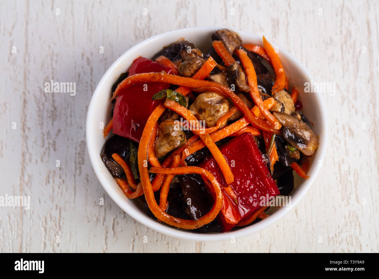 Appetizing grilled salad with mushrooms, carrot and pepper Stock Photo ...