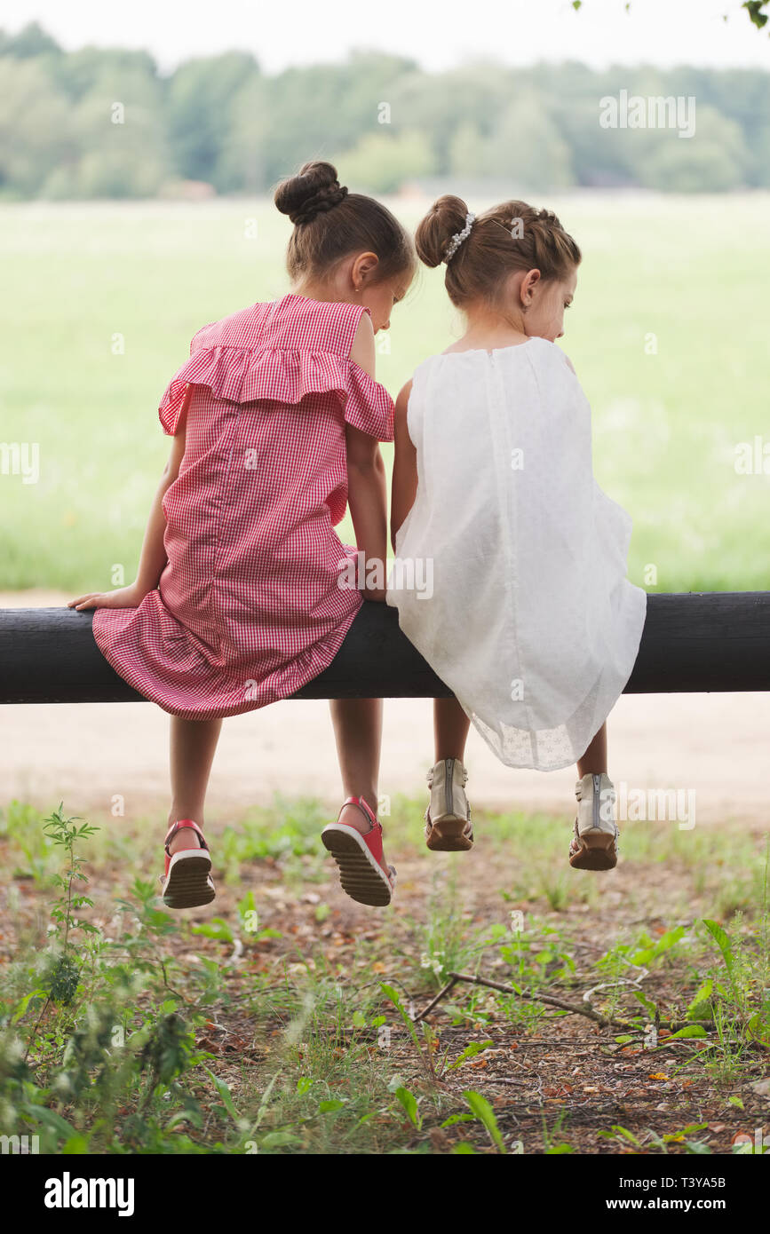 best happy friends playing in summer park Stock Photo - Alamy