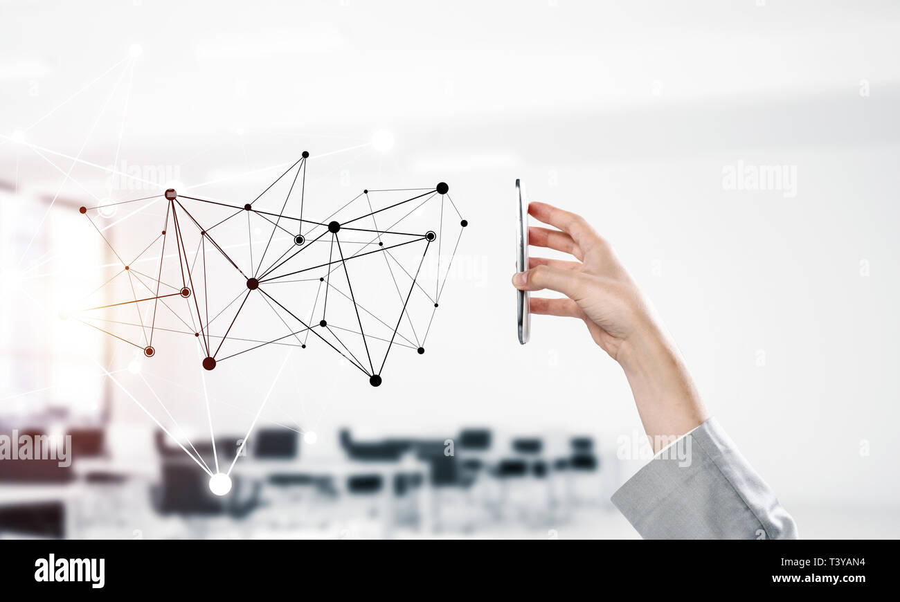 Business and technology concept with networking grid and man using ...