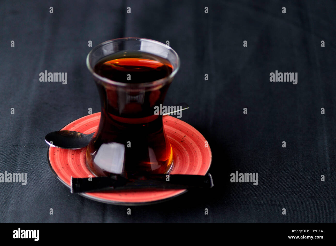 a cup of tea lit by artificial light Stock Photo - Alamy