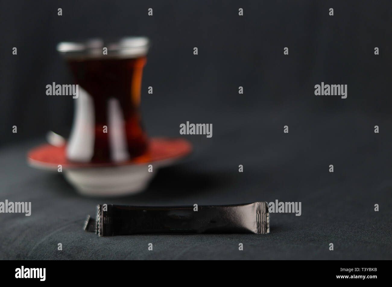 a cup of tea lit by artificial light Stock Photo - Alamy