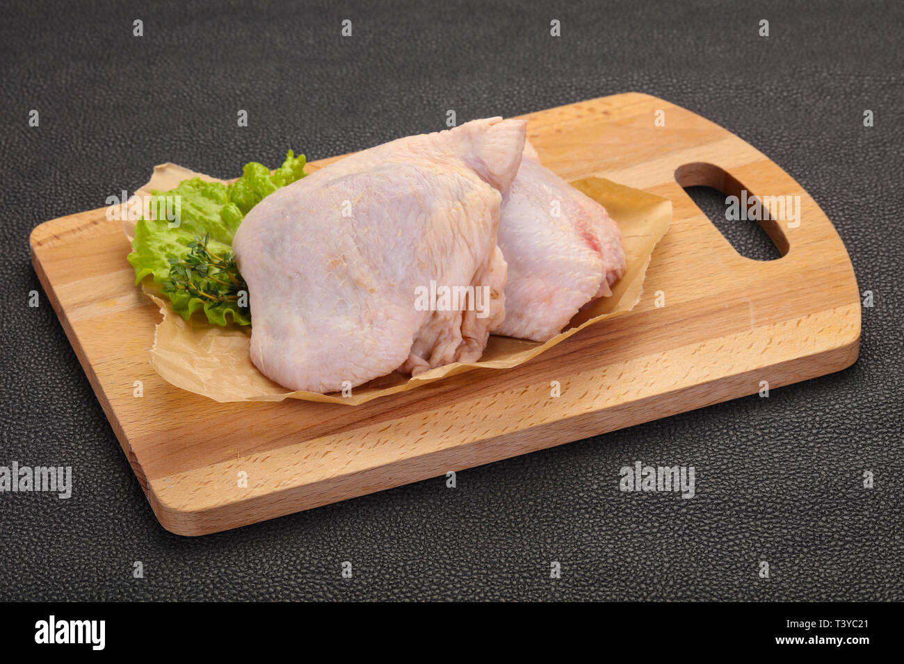 Raw chicken hip ready for cooking Stock Photo - Alamy