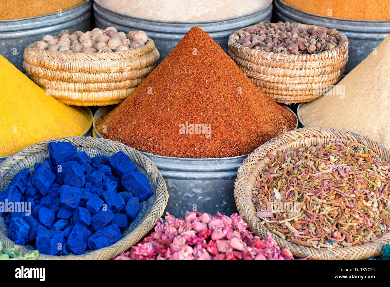 Arrangement of Moroccan spices, herbs, nuts and powder paint Stock ...