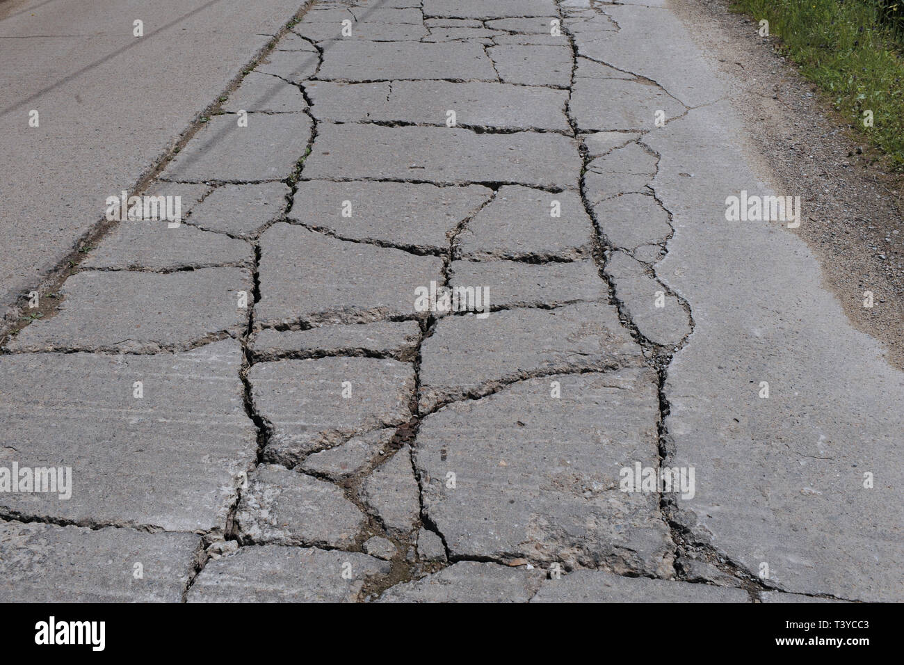 Damaged road in bad condition, Romania, Banat Stock Photo - Alamy
