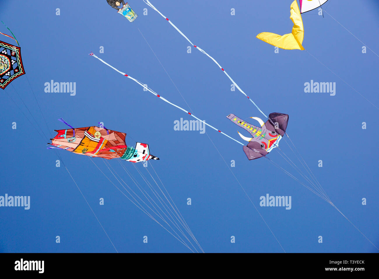 Various kites flying on the blue sky in the kite festival Stock Photo ...
