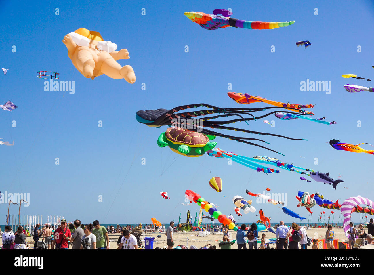 Various kites flying on the blue sky in the kite festival Stock Photo ...