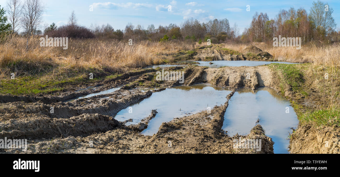 Off-road track. Tire imprints. Puddle detail. Military area. Impassable ...