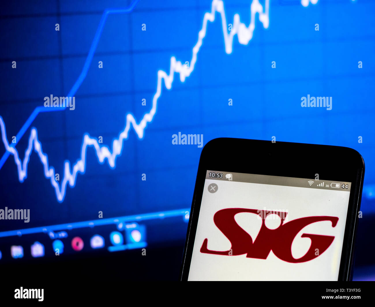 In this photo illustration a SIG plc logo seen displayed on a smart ...