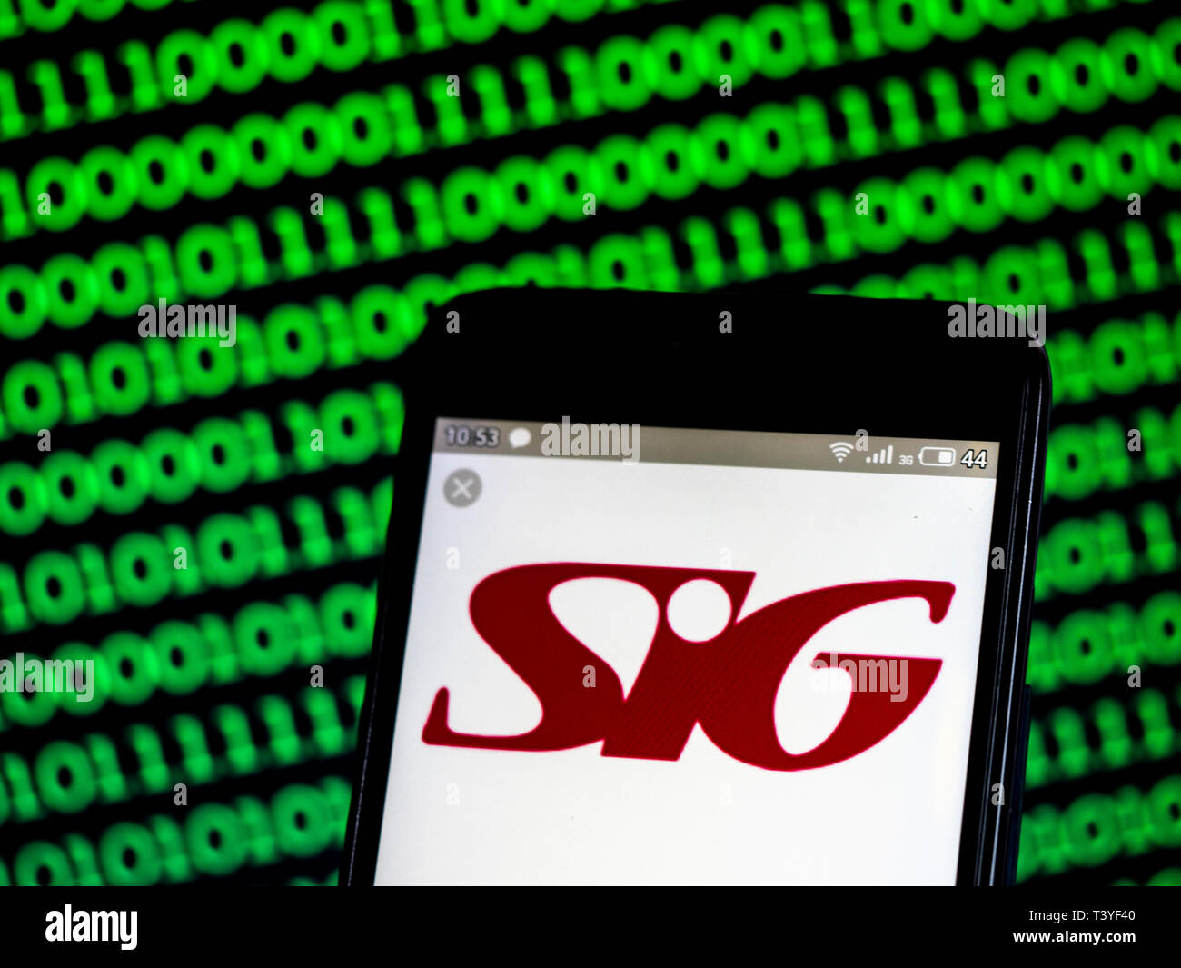 In this photo illustration a SIG plc logo seen displayed on a smart ...