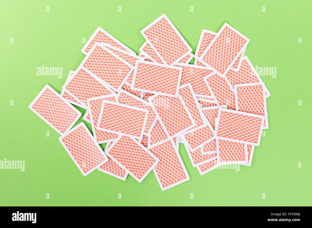 Spread out, face down cards isolated on green background Stock Photo ...