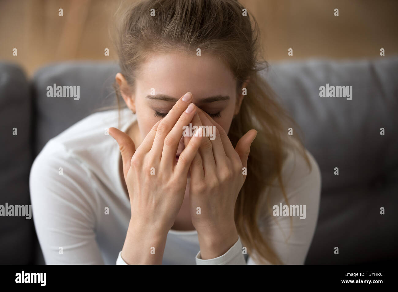 Close up thoughtful woman covered face in hands, feeling pain Stock ...