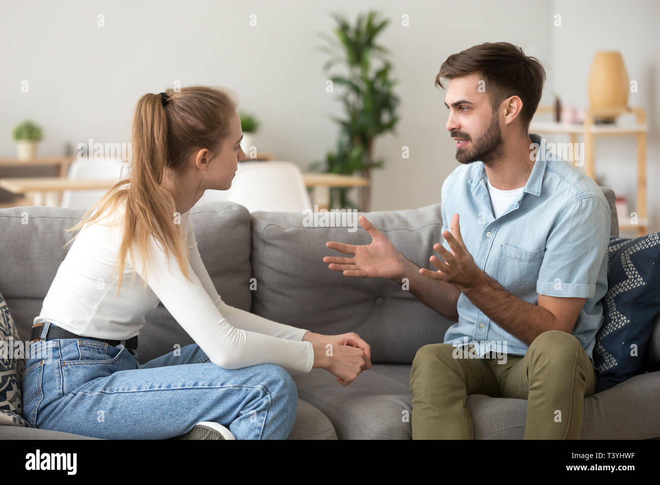 Sitting together and talking hi-res stock photography and images - Alamy