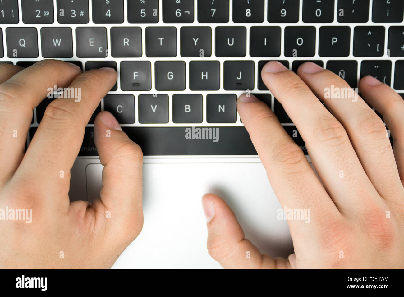 Hands typing black computer keyboard hi-res stock photography and ...
