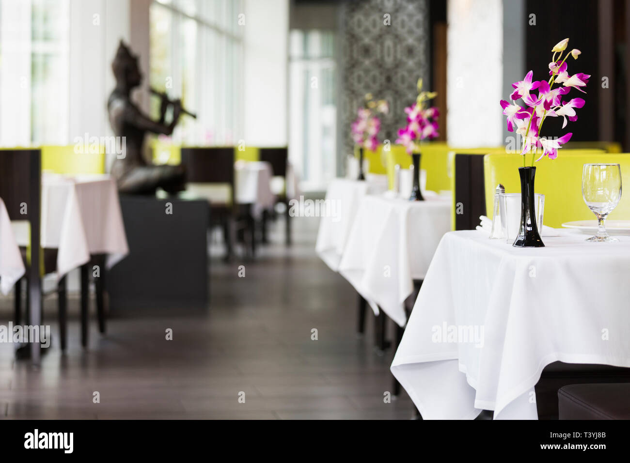 Set tables in Thai restaurant Stock Photo - Alamy