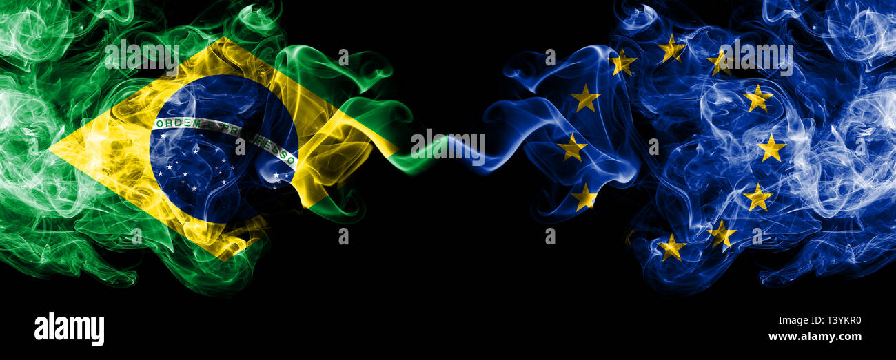 Brazil vs European Union, EU smoke flags placed side by side. Thick ...