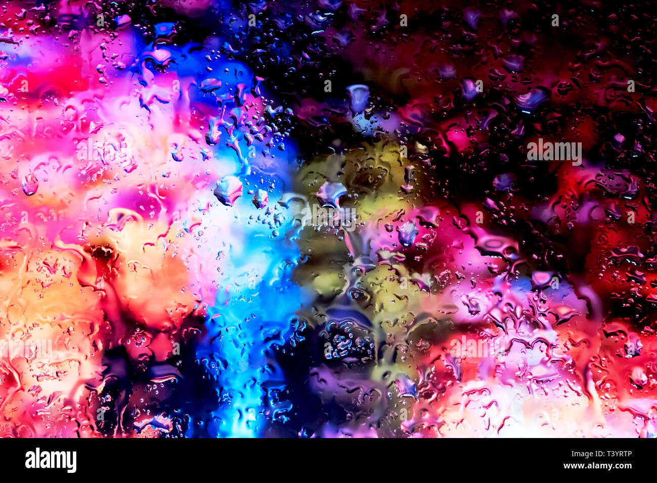 Neon lights with water drops city lights close up graphic resources ...