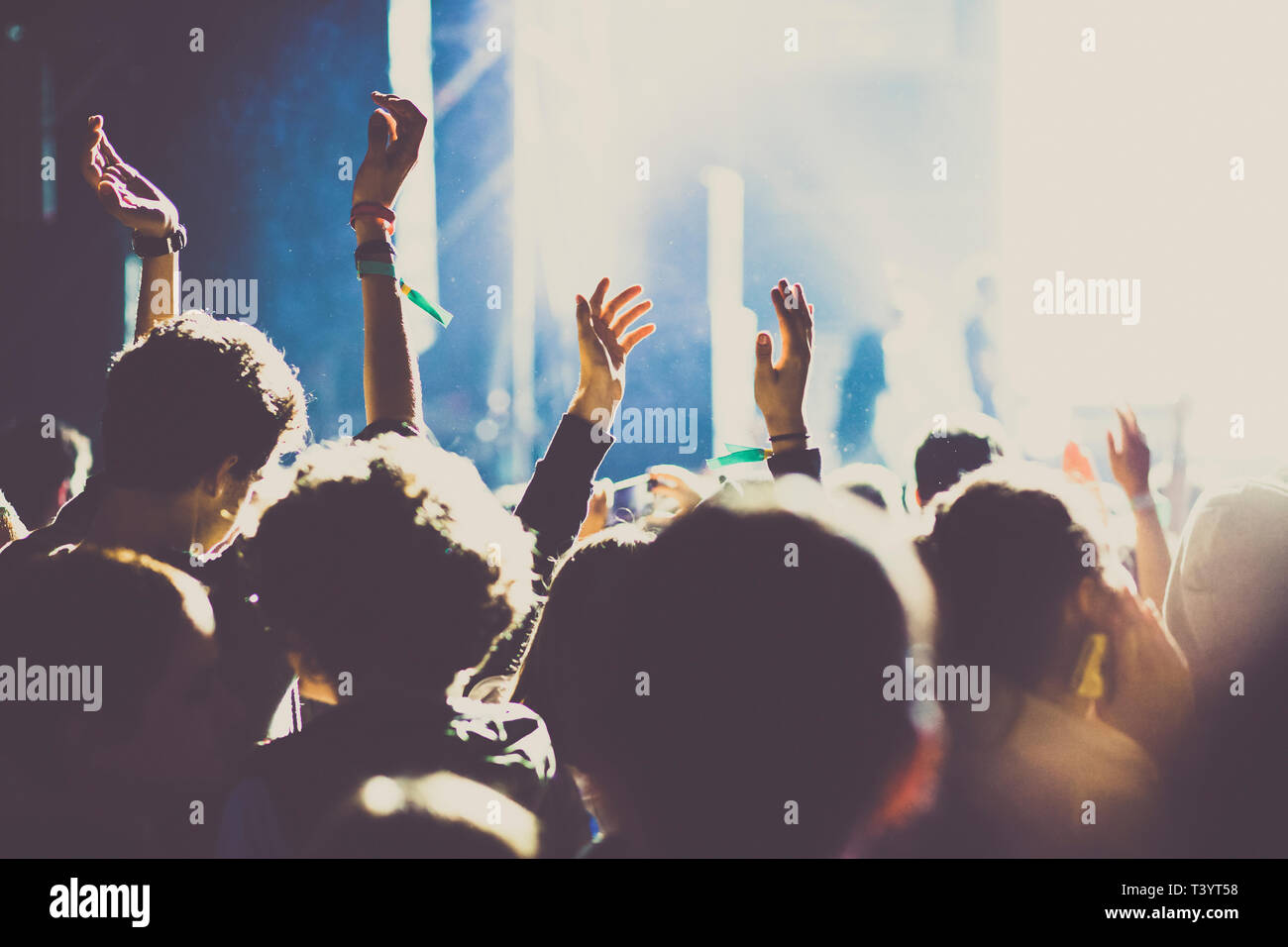 cheering crowd with raised hands at concert - music festival Stock ...