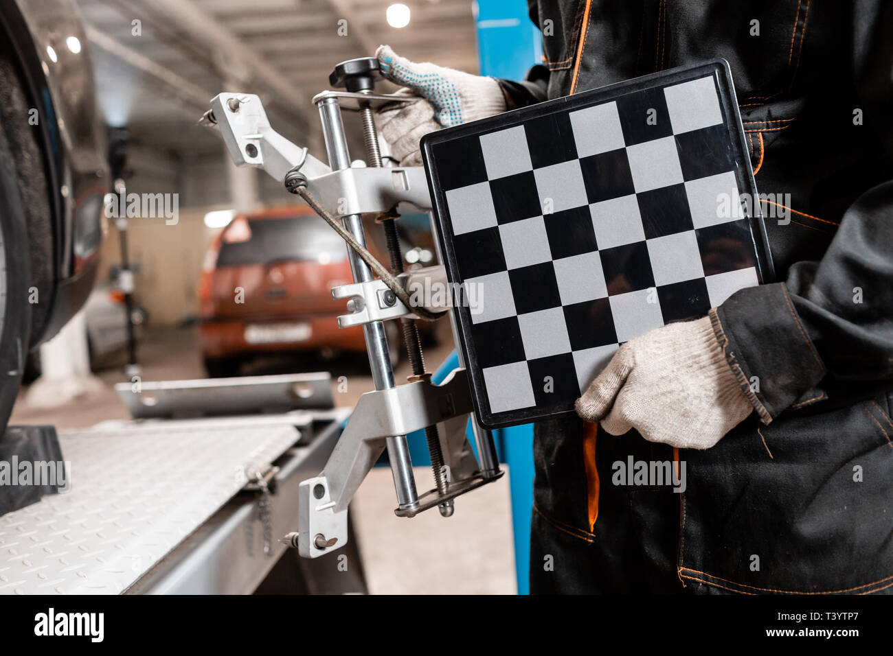 collapse-convergence. auto mechanic sets the car for diagnostics and ...