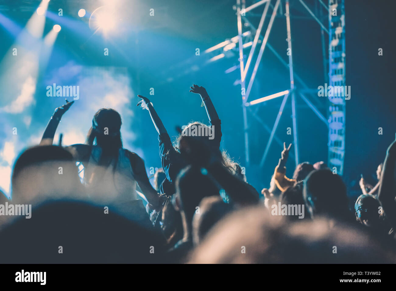 cheering crowd with raised hands at concert - music festival Stock ...