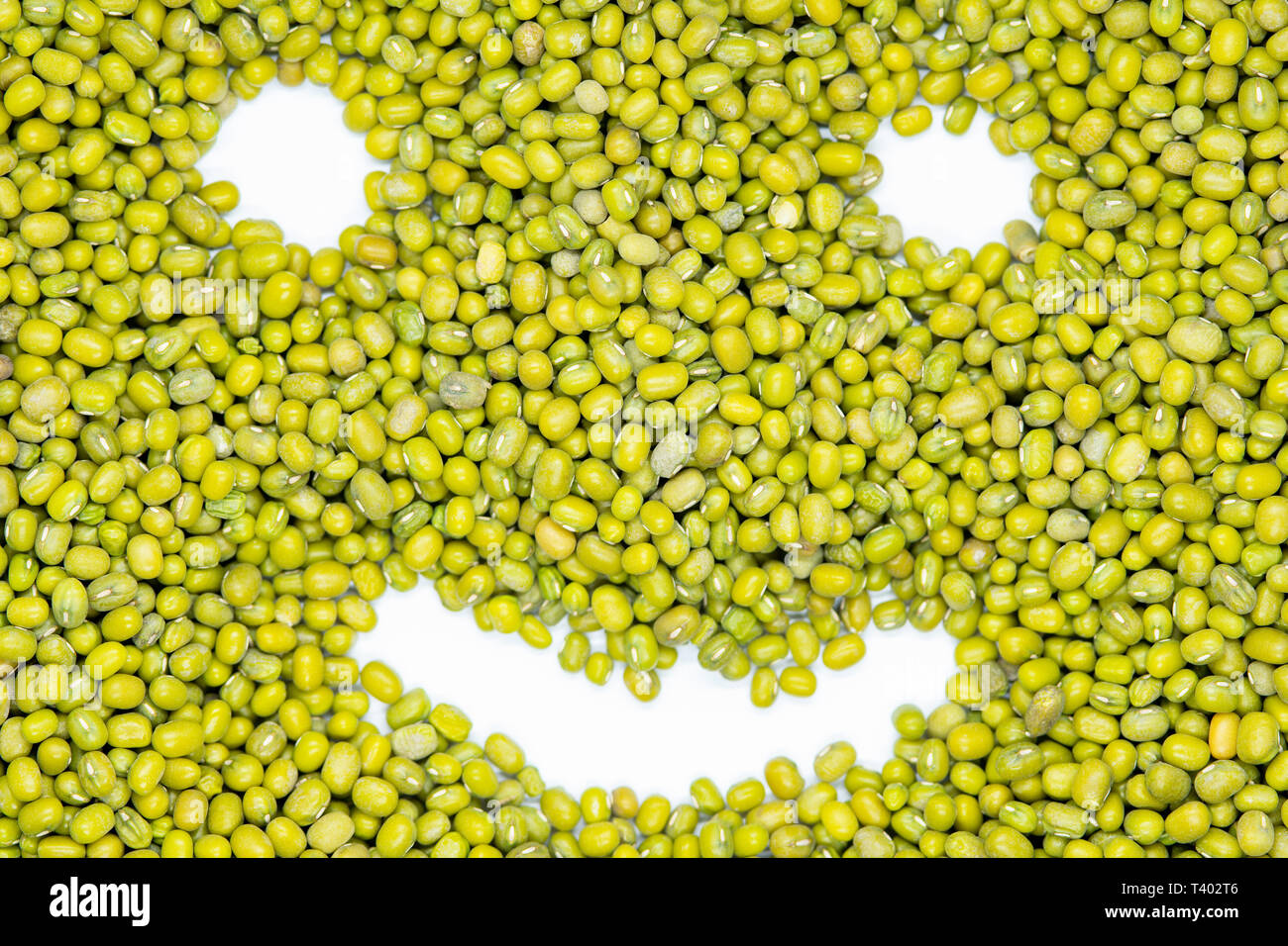 Mung bean, funny smile face, isolated, close up. Maash, moong or green ...