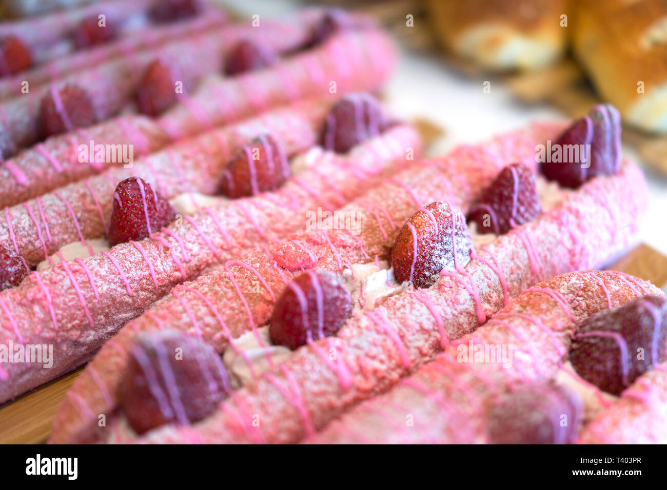 Delicious Strawberry Icing Bread in a Bakery Shop. Horizontal Stock ...