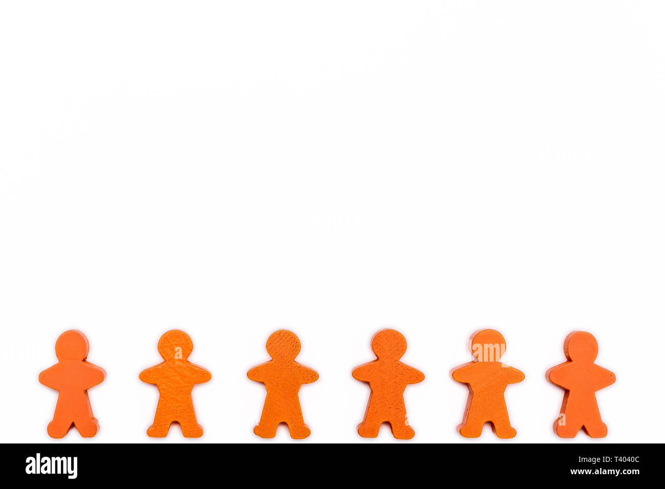 White background with human chain of wooden figures as a symbol of a ...