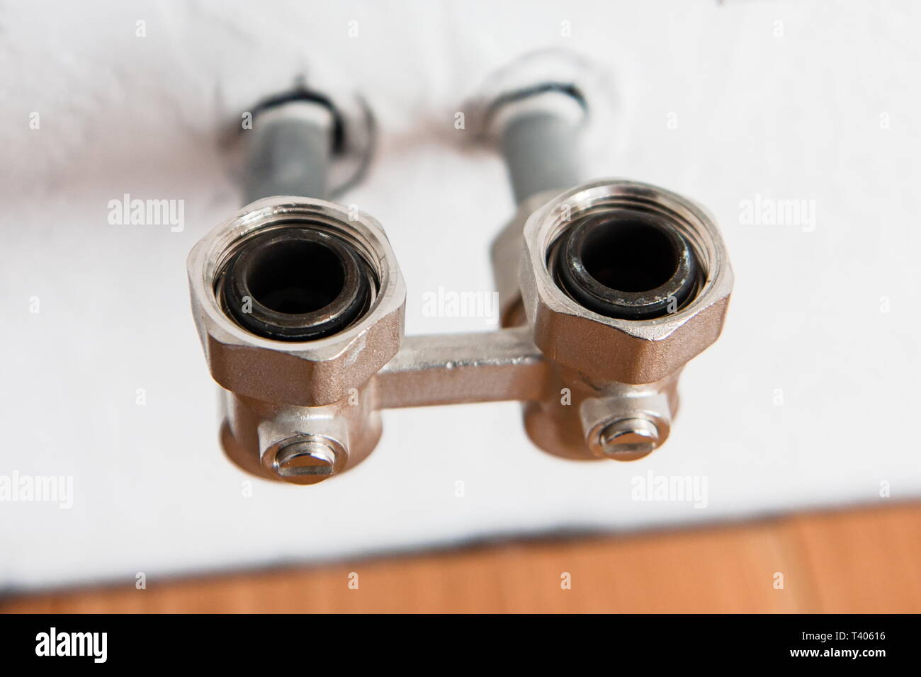 pipes hidden in the wall for radiator mounting system Stock Photo - Alamy