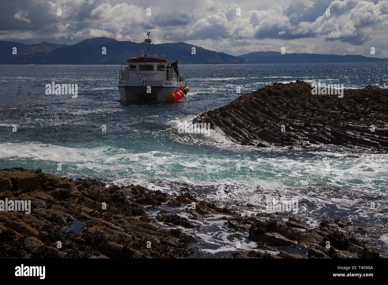 Treshnish Isles tour boat leaving Staffa Island Southern Hebrides ...
