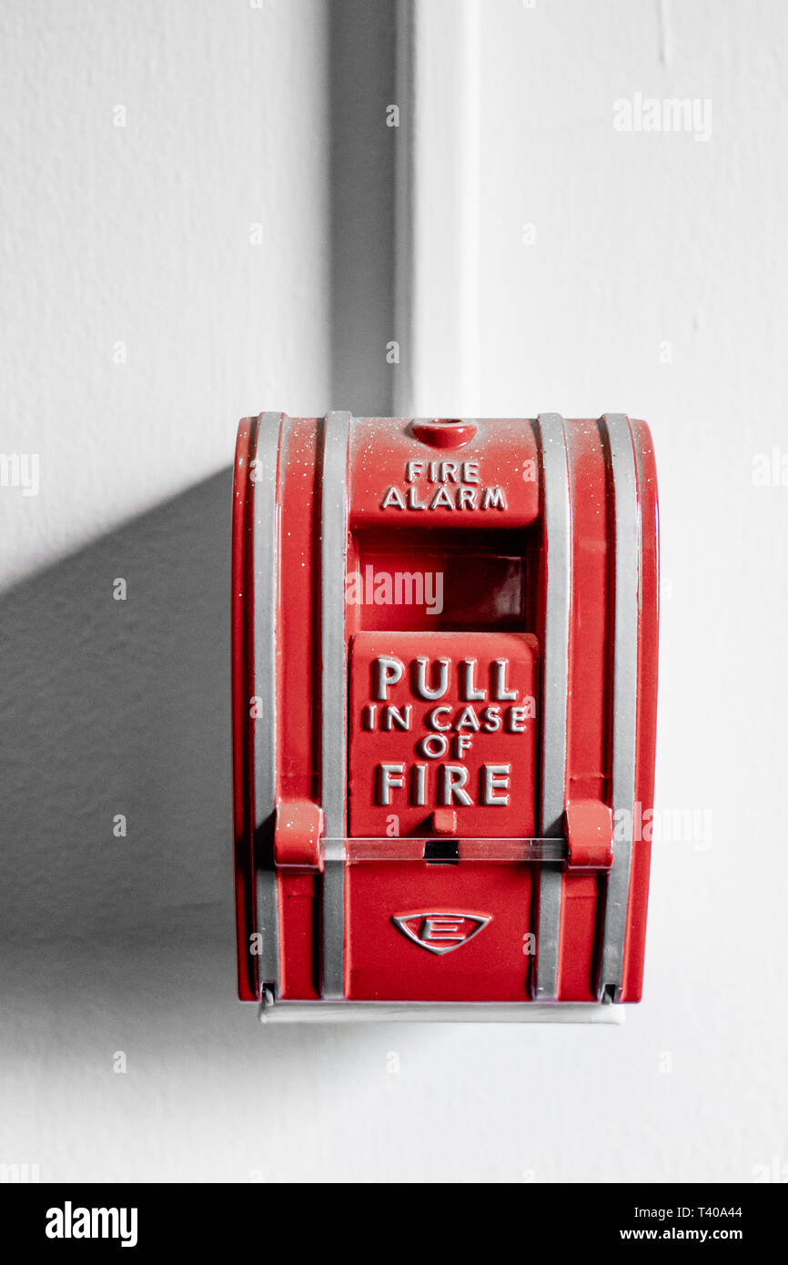 red fire alarm on a white wall Stock Photo - Alamy