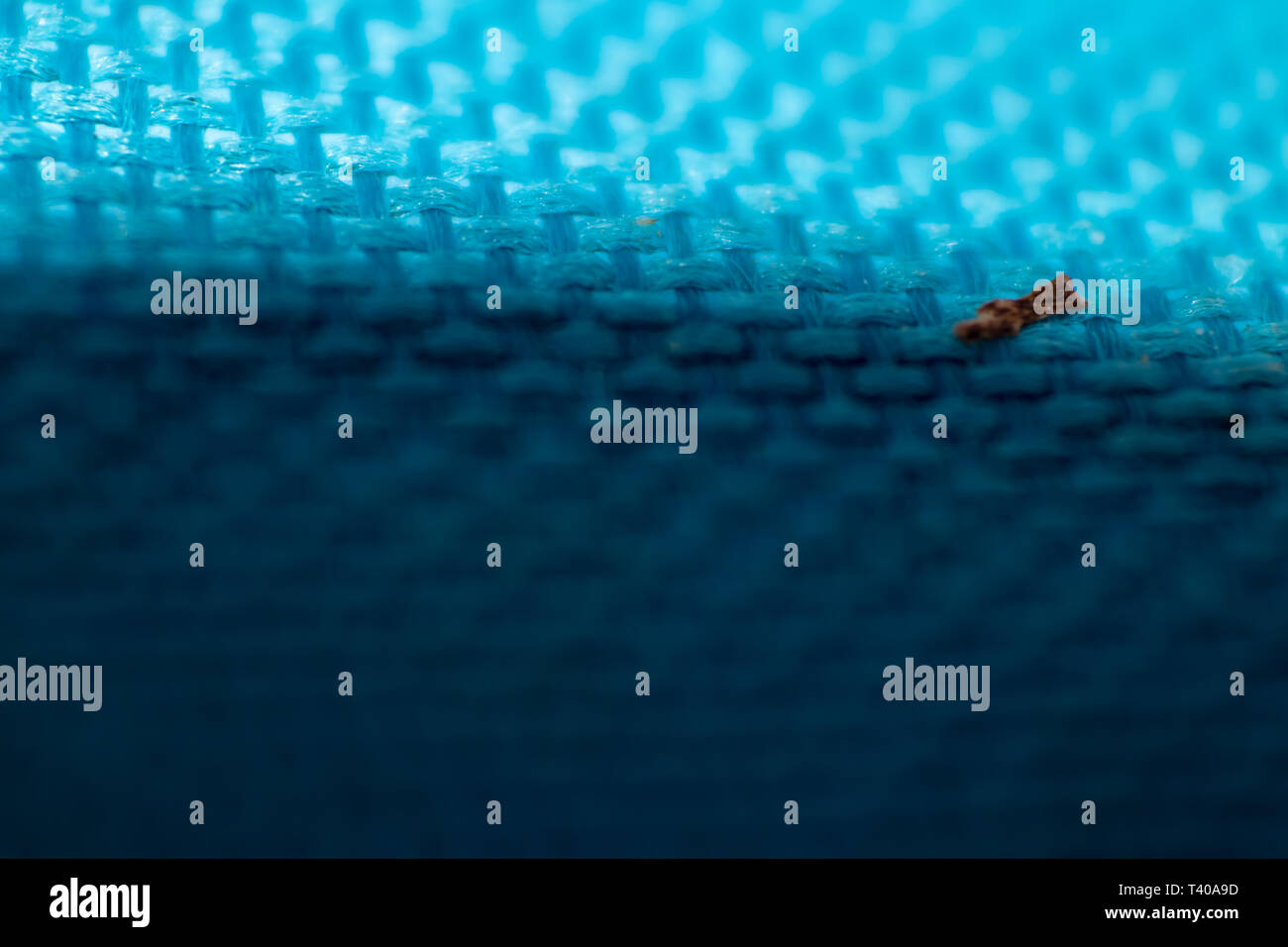 a macro shoot of swollen dirty blue cloth texture. bottom side got ...