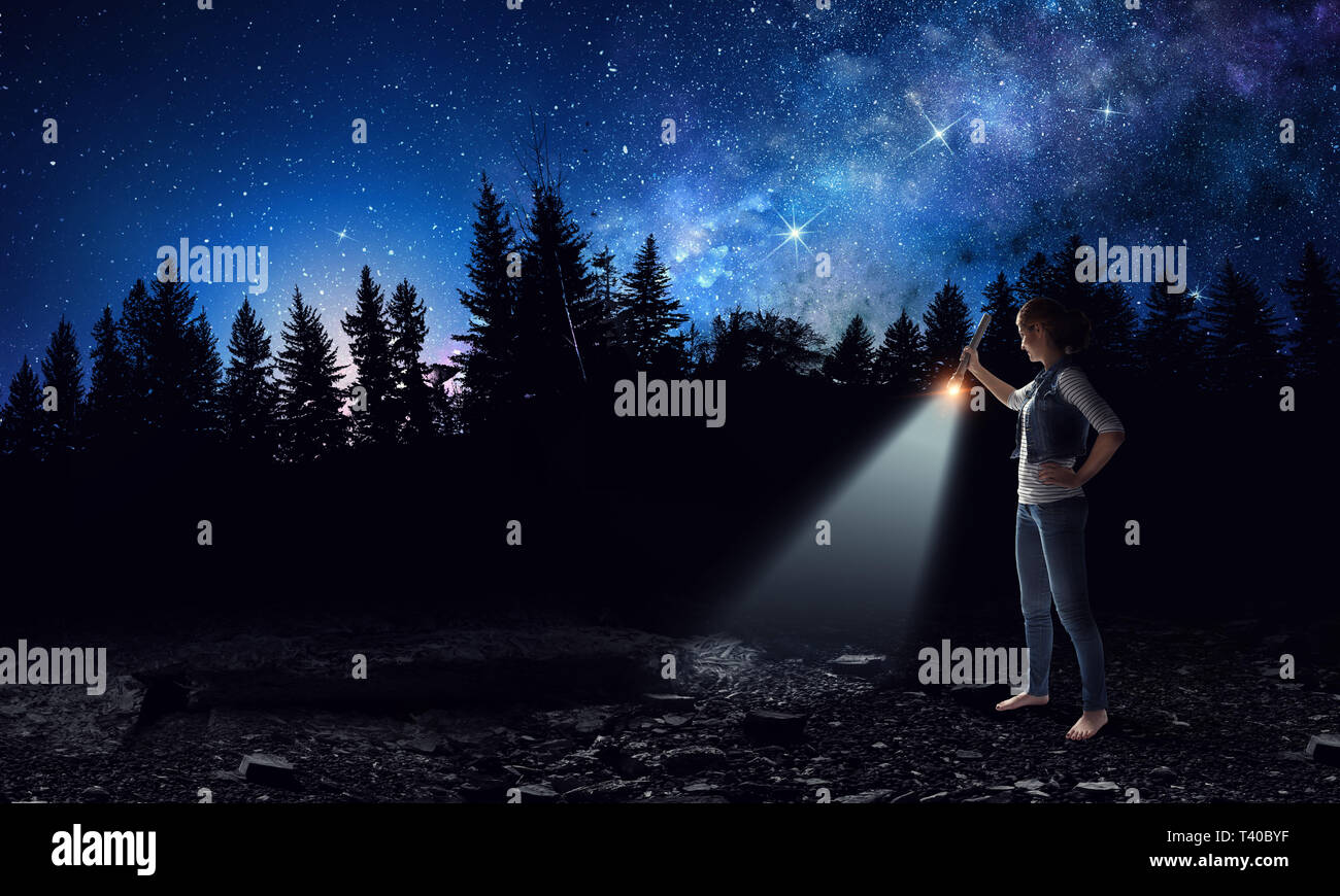 Woman flashlight dark hi-res stock photography and images - Alamy