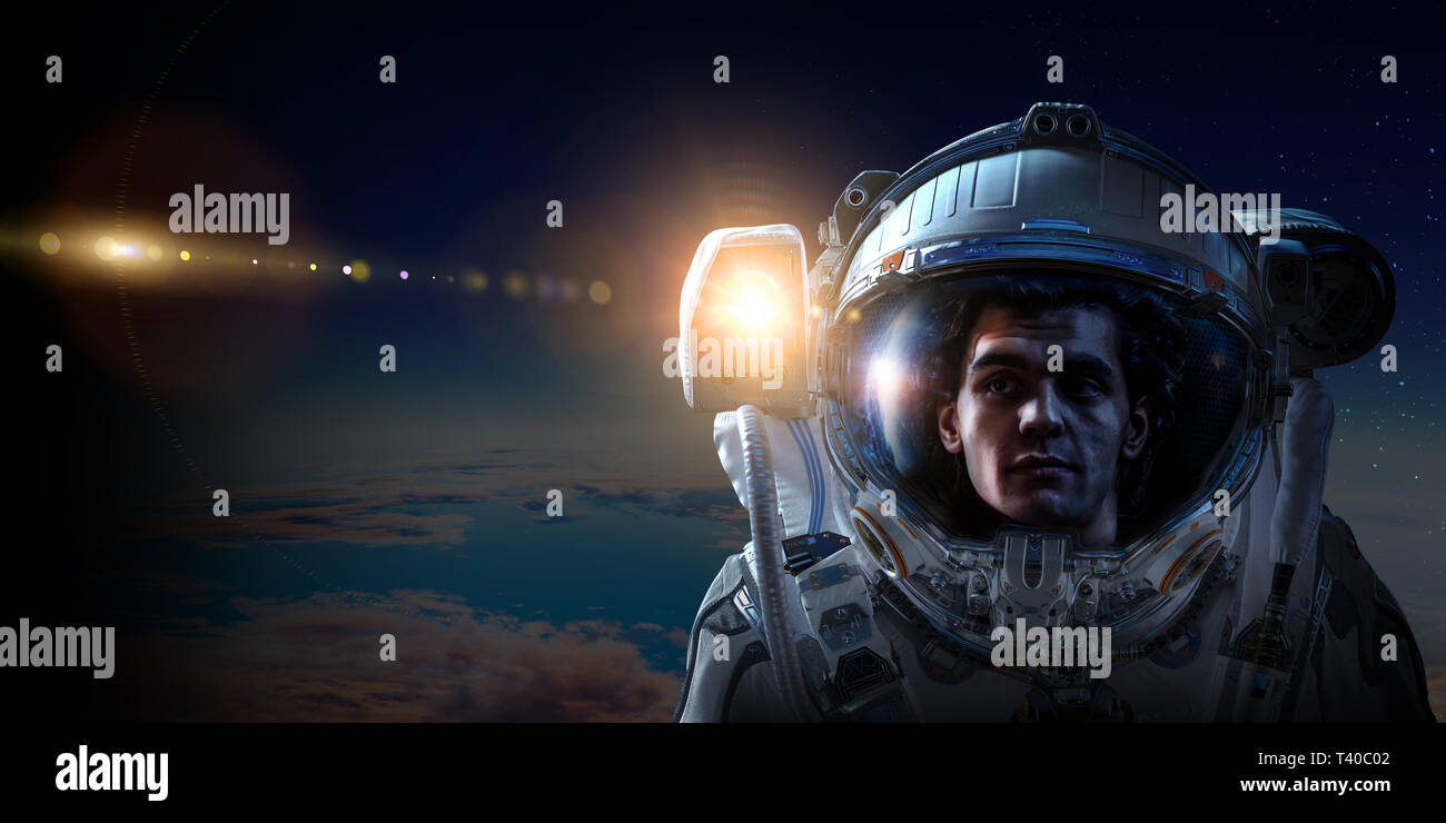Astronaut in space on planet orbit Stock Photo - Alamy