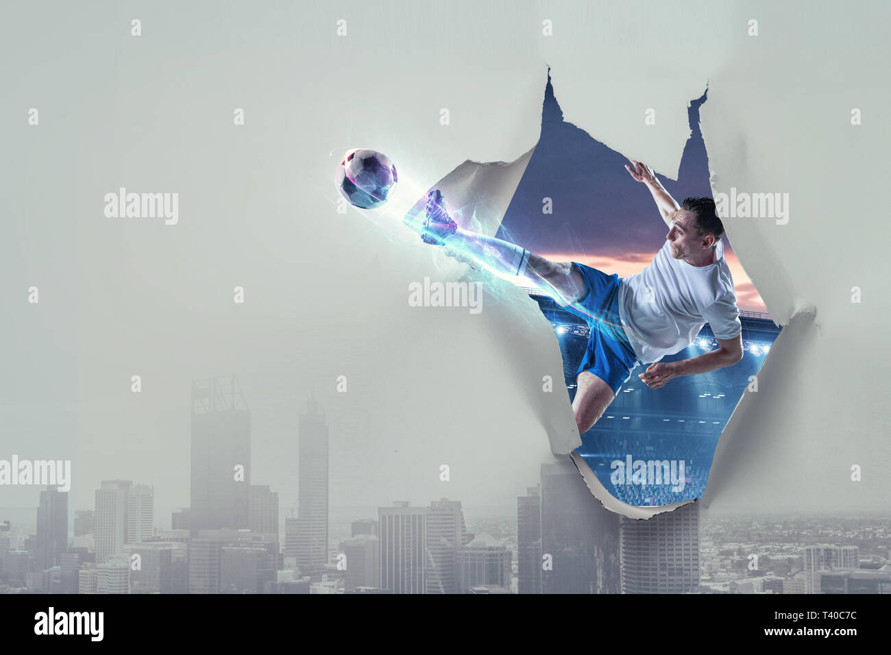 Paper breakthrough hole effect and soccer player. Mixed media Stock ...