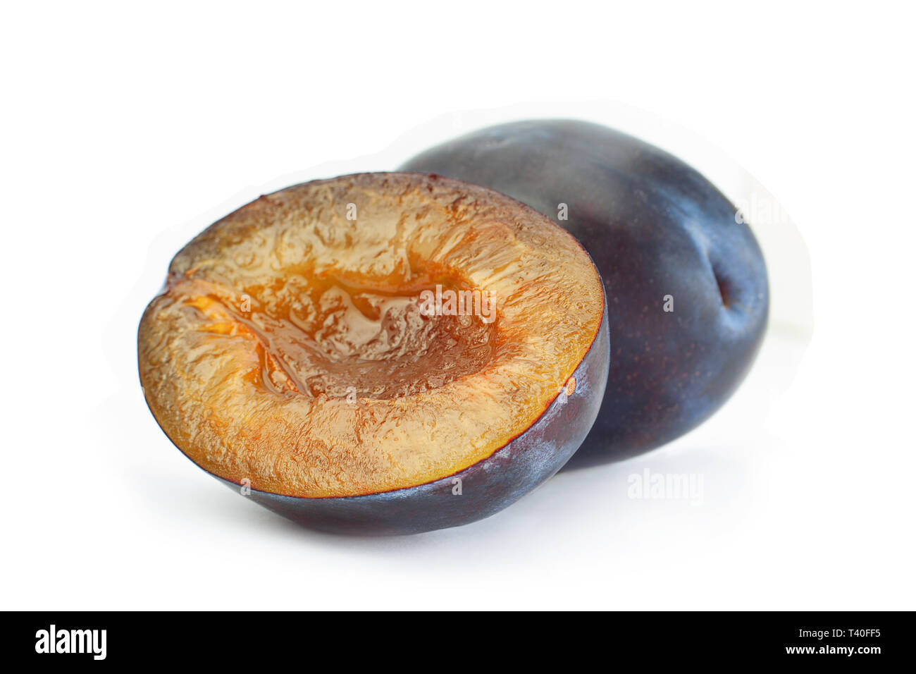 Blue plum fruit closeup isolated on white background Stock Photo - Alamy