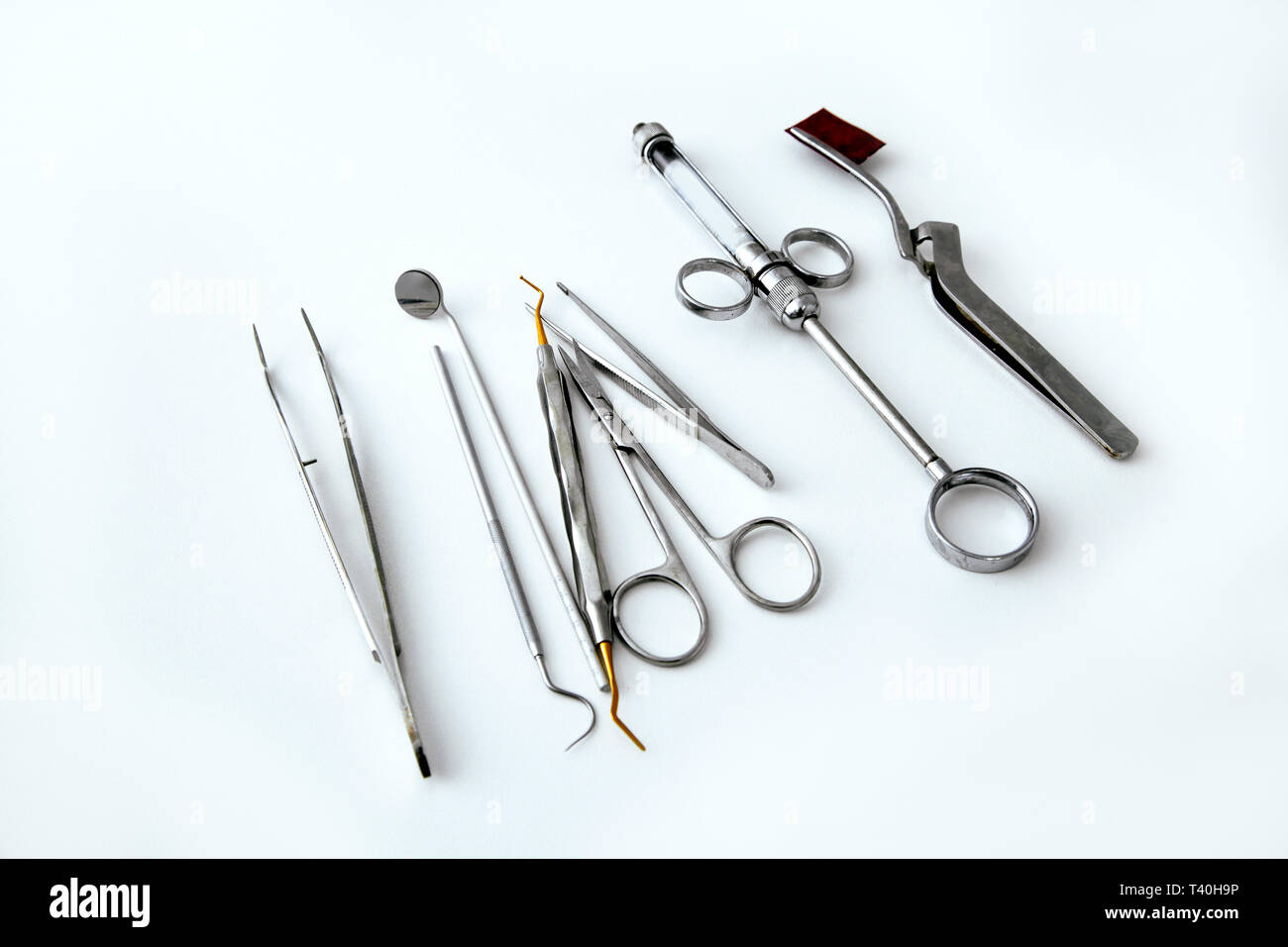 Dental equipment and instruments are on a white table Stock Photo - Alamy