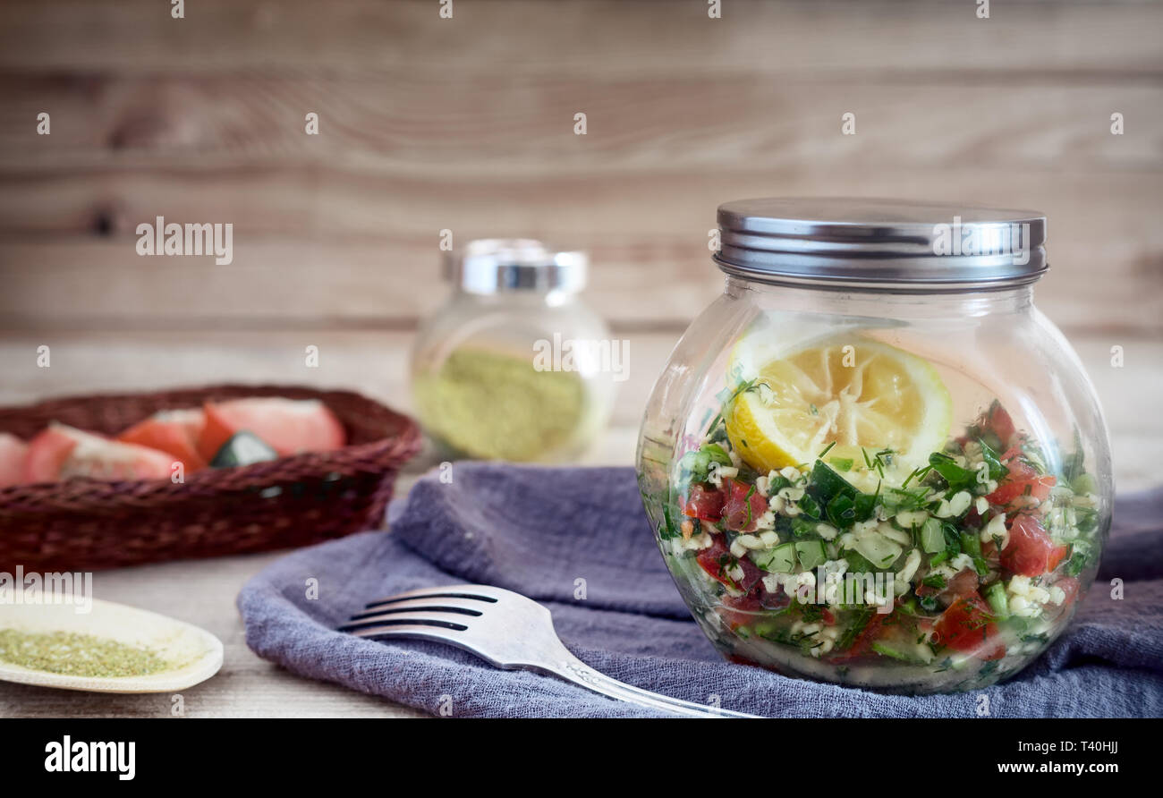 Salad Tabule - a common dish of Arabic cuisine Stock Photo - Alamy