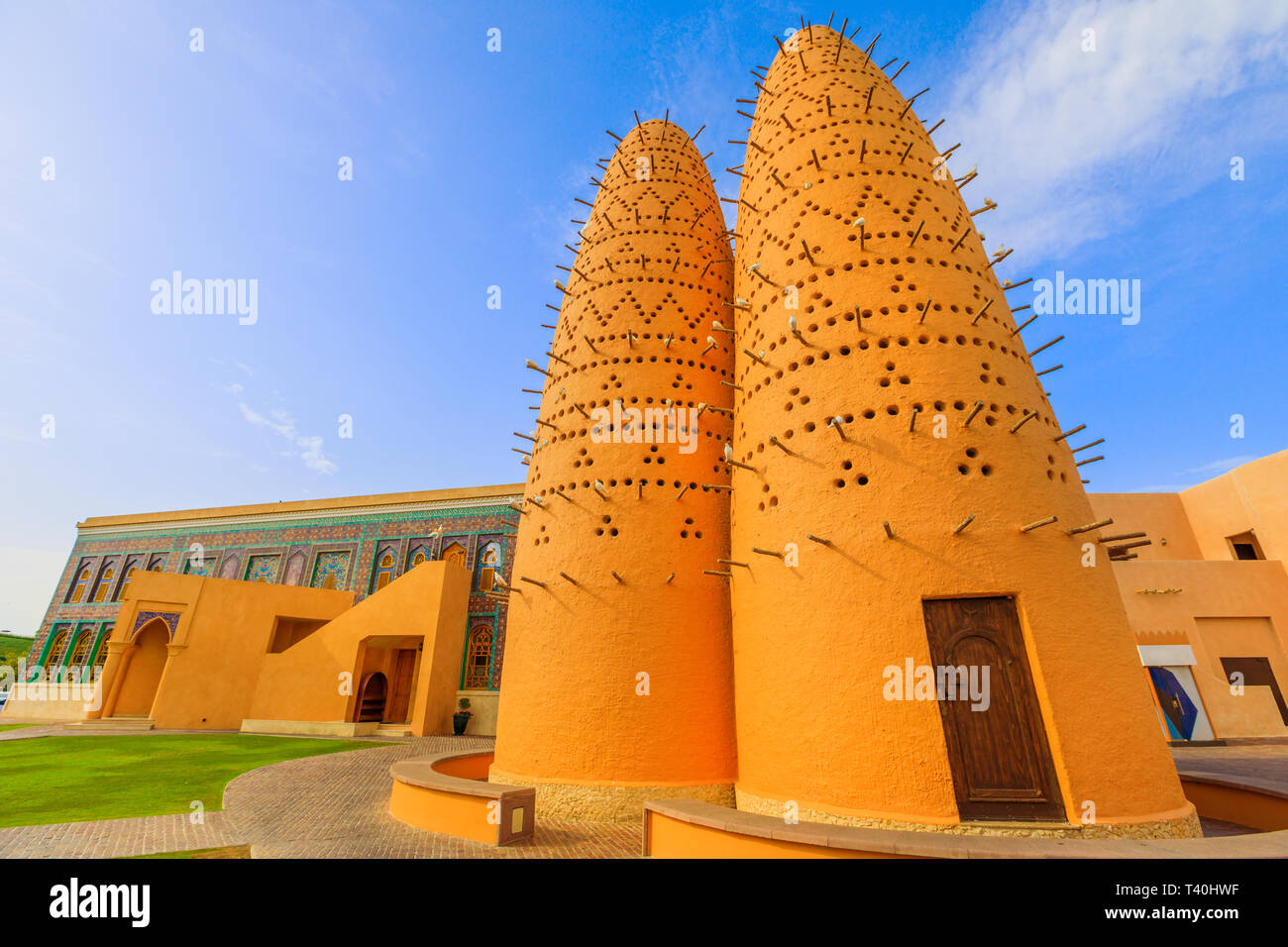 Mosque in Katara with famous pigeon towers. Katara is a cultural ...