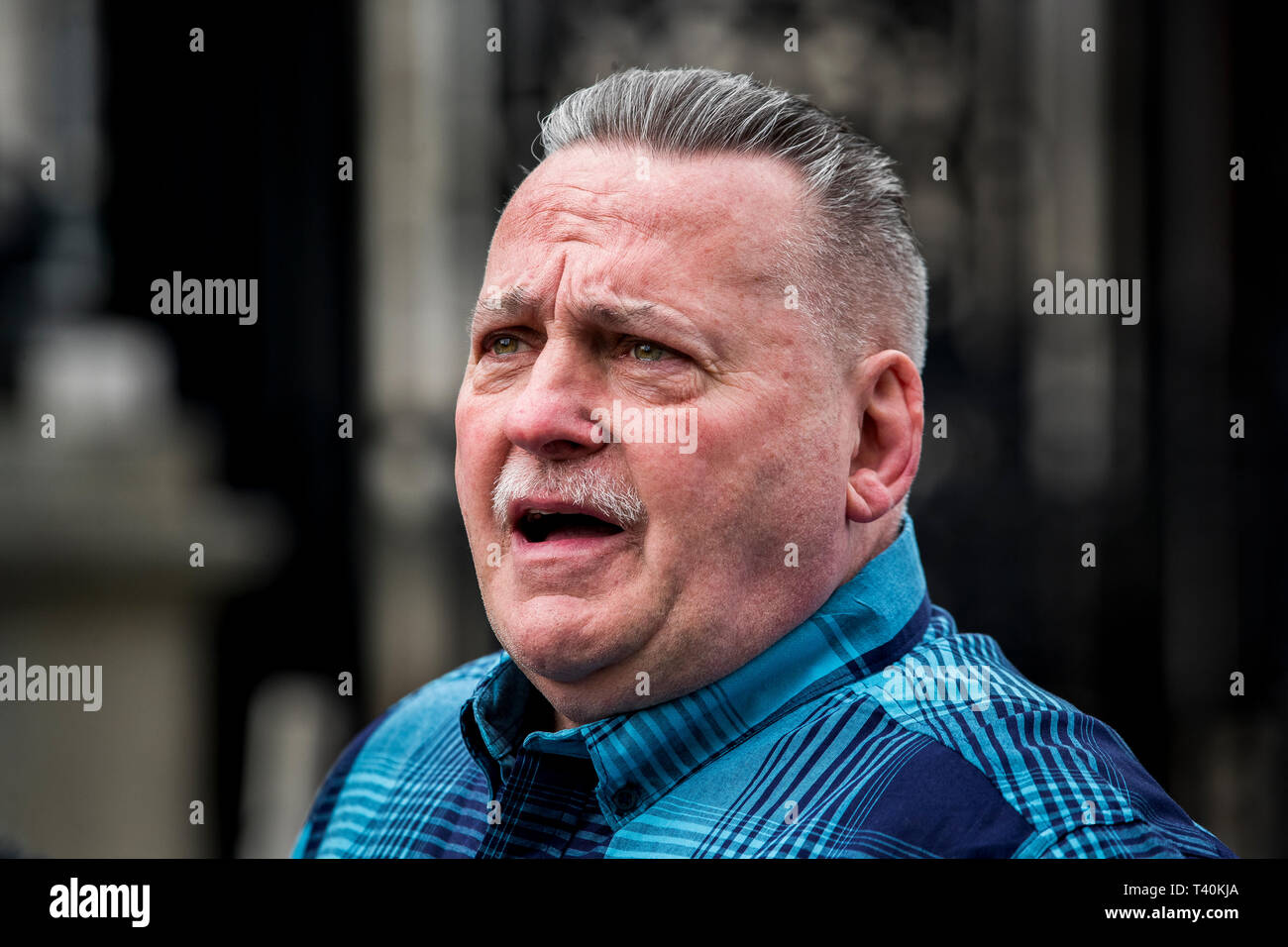 John Heaney speaks outside Belfast's High Court, after a failed bid by ...
