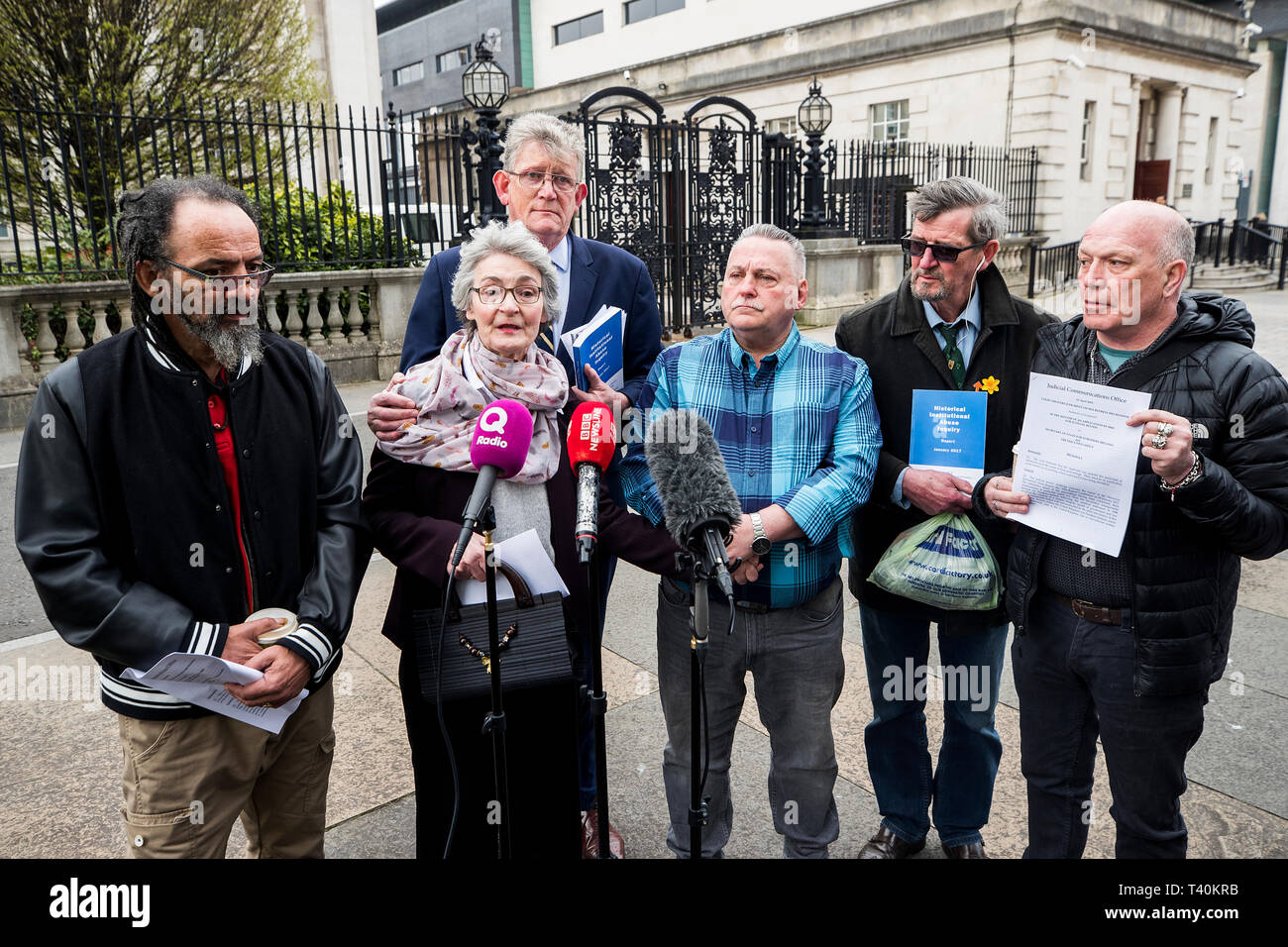 Kate McCausland (left) speaks of her mother Una Irvine outside Belfast ...