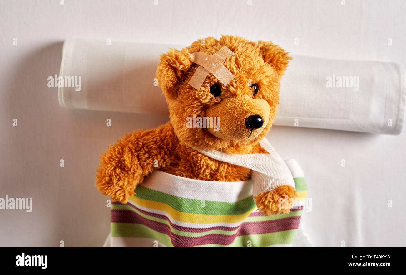 Teddy bear bandaged head hi-res stock photography and images - Alamy